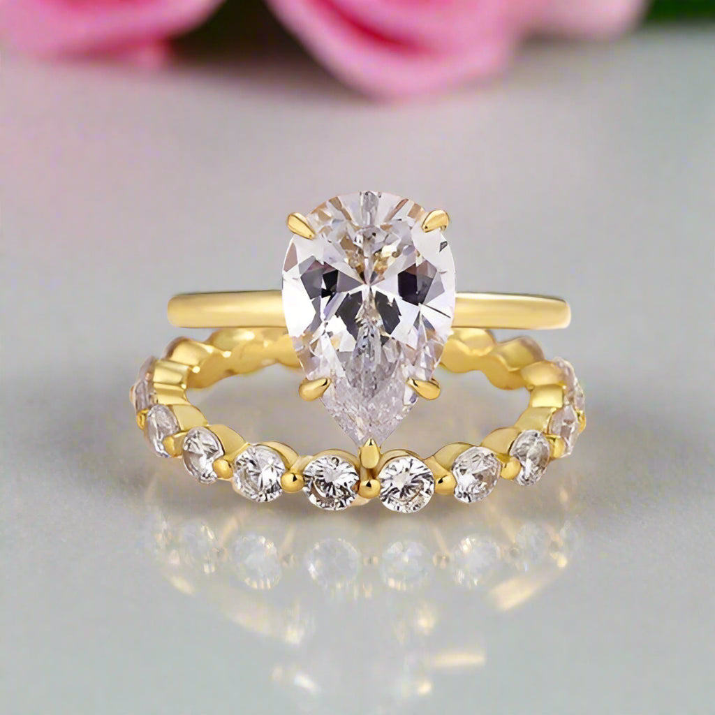 Classic Yellow Gold Pear Cut Wedding Ring Set from Black Diamonds New York